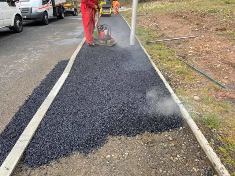 Install Tarmac Roadway, Foot Paths and Kerbing - JS Crawford